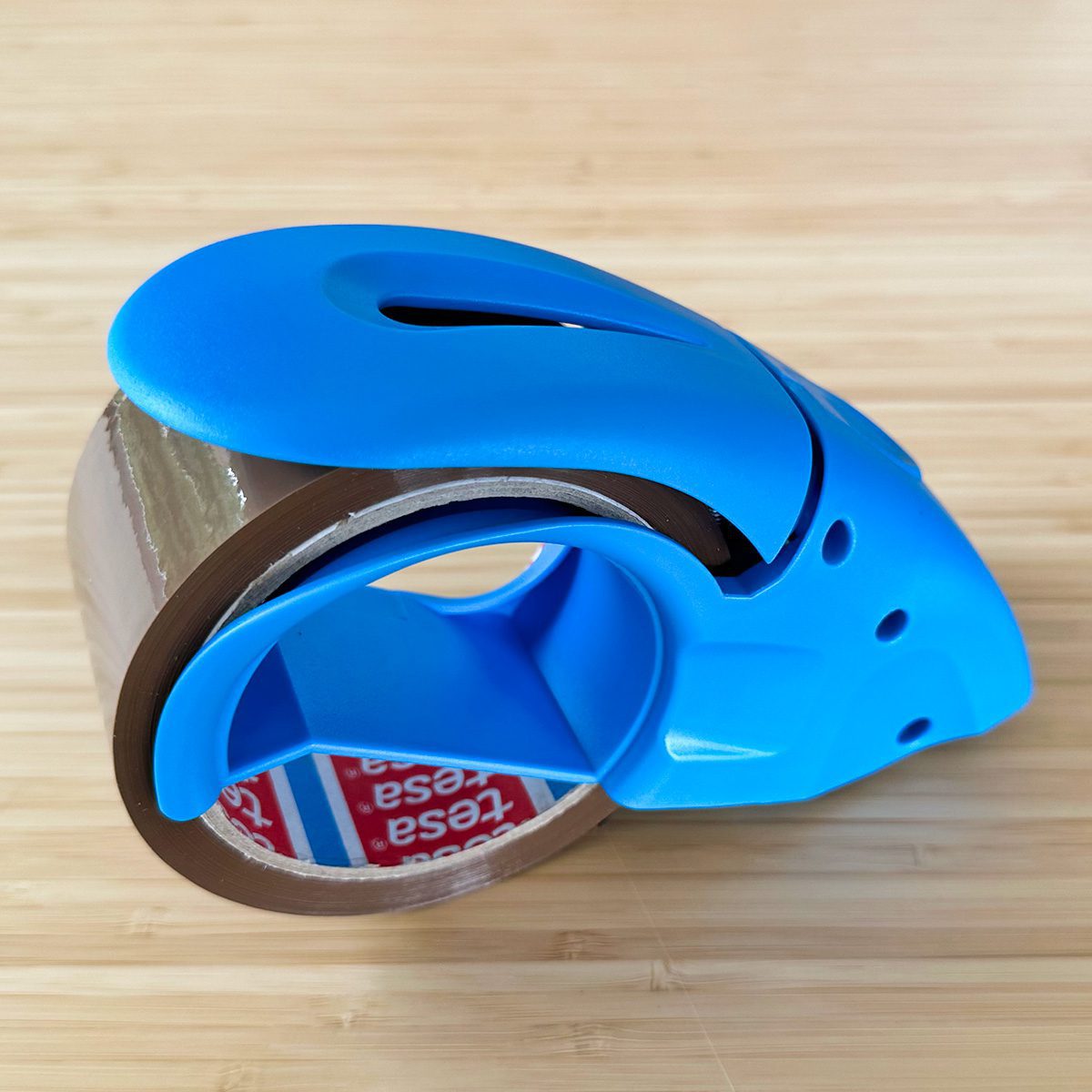 Tesa Paketbandabroller – leichtes Einfäden garantiert